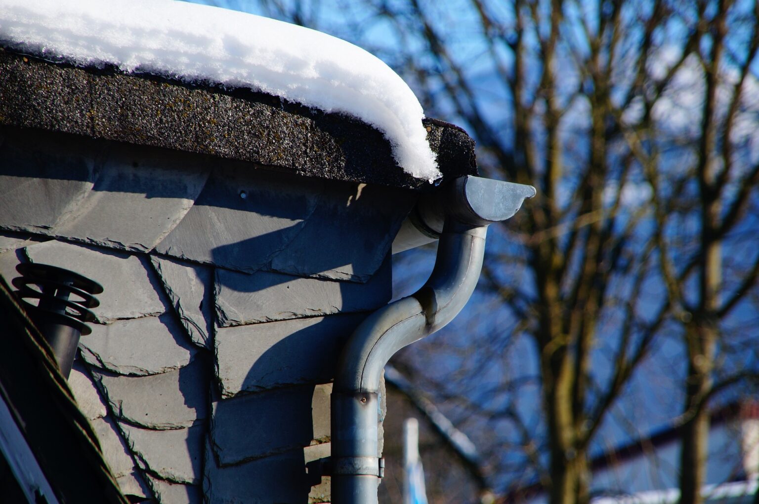 Winter Gutter Damage? Know When to Replace Before Spring - The Gutter Guys